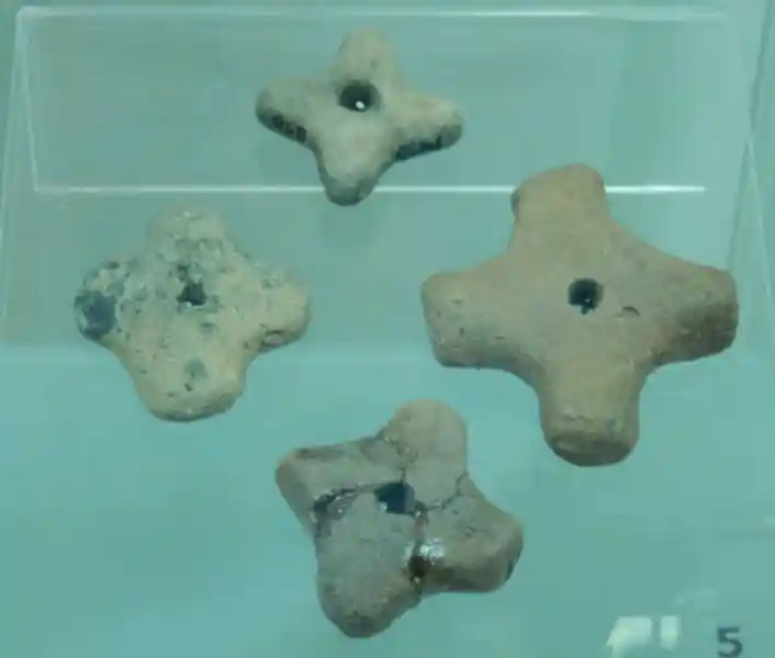.Cross carvings with a hole in the center